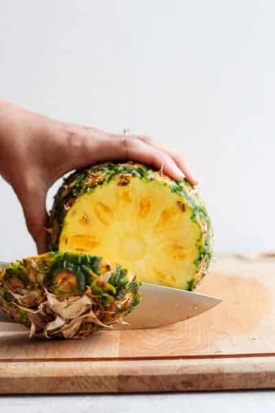 How to Cut a Pineapple [Step-by-Step Tutorial} - Feel Good Foodie