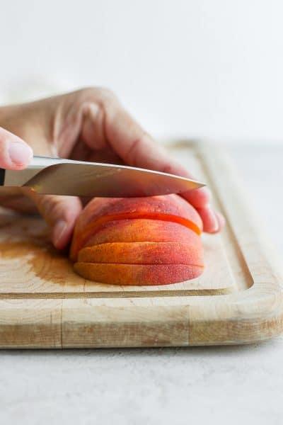 How to Cut a Peach [Step-by-Step Tutorial} - Feel Good Foodie