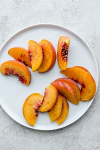 How to Cut a Peach [Step-by-Step Tutorial} - Feel Good Foodie
