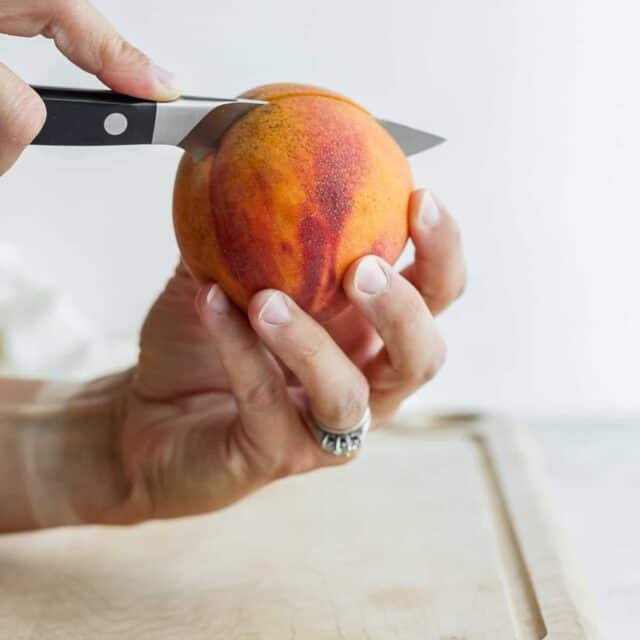How to Cut a Peach [Step-by-Step Tutorial} - Feel Good Foodie